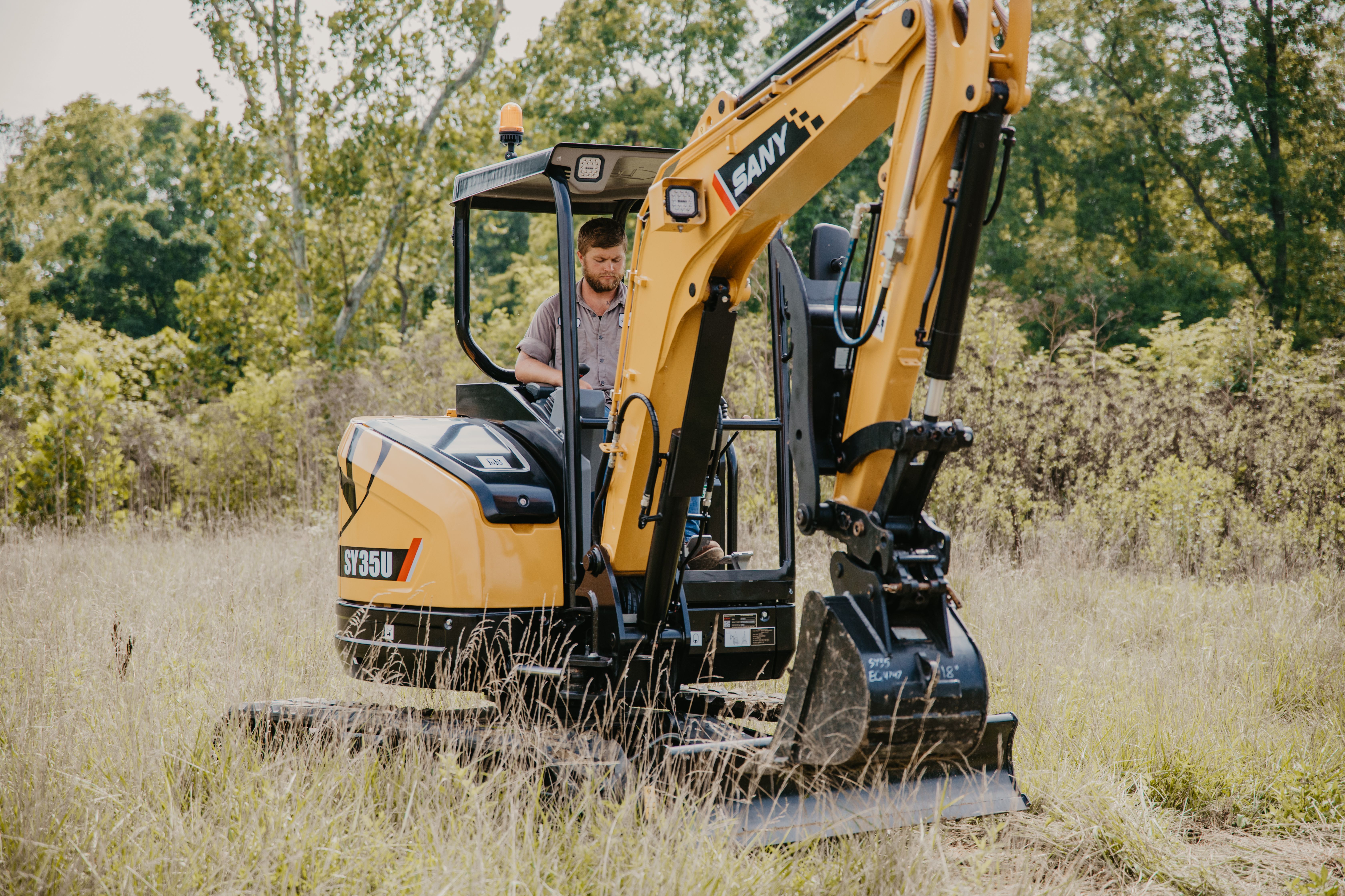 Bison Heavy Equipment — Excavator vs. Backhoe: Understanding the ...